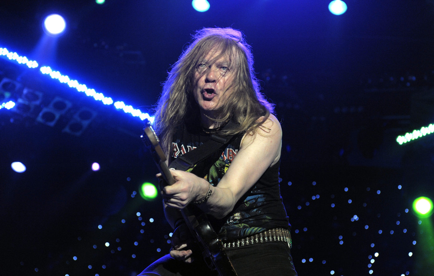 Watch Iron Maiden’s Janick Gers lose grip of his guitar sending it ...
