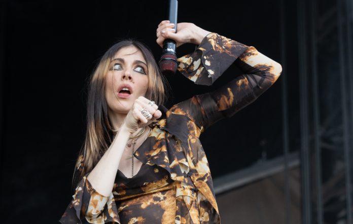 Watch Caroline Polachek sing Charli XCX and George Daniel down the ...